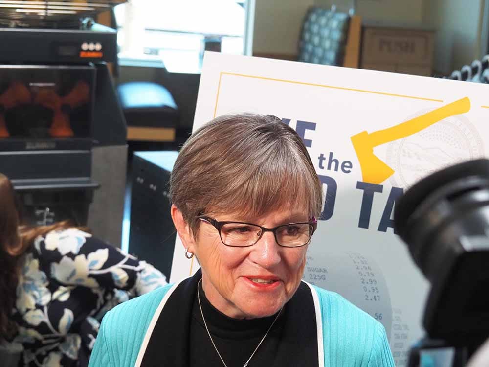 Kelly signs law to phase out food sales tax - The Iola Register