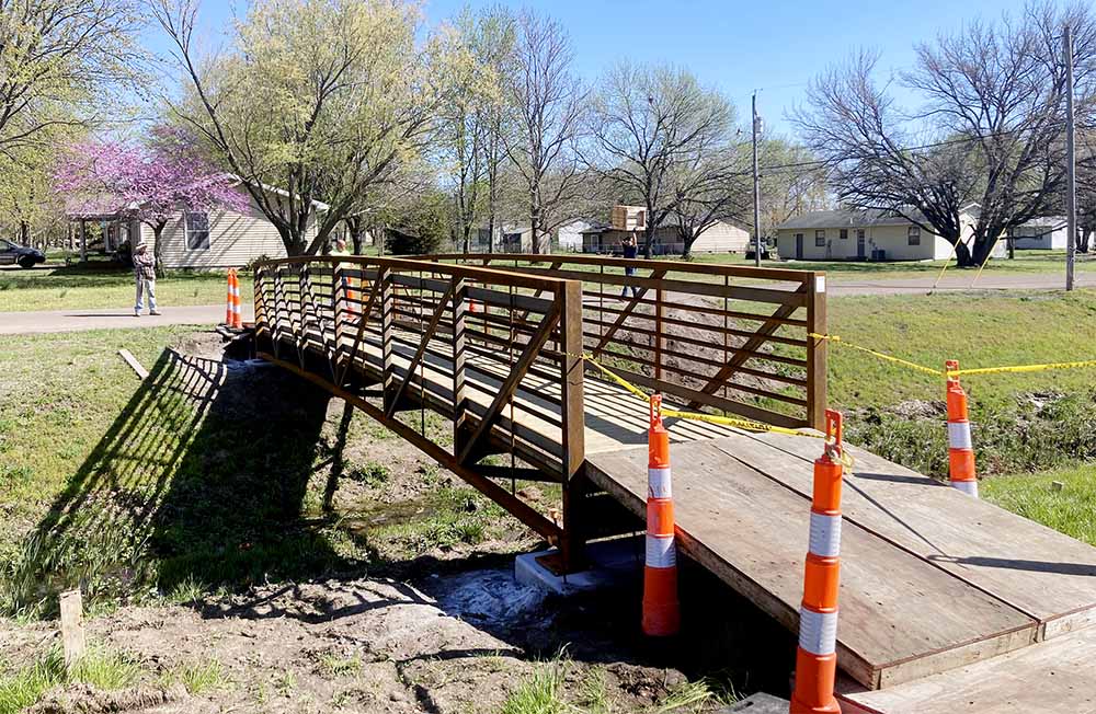 New pedestrian bridge connects to school - The Iola Register