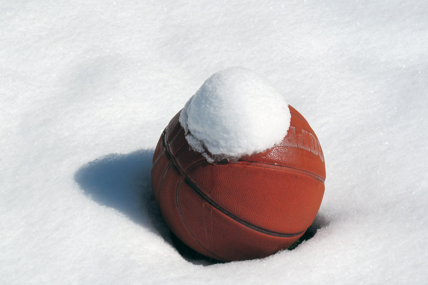 Winter hits local sports schedules - The Iola Register
