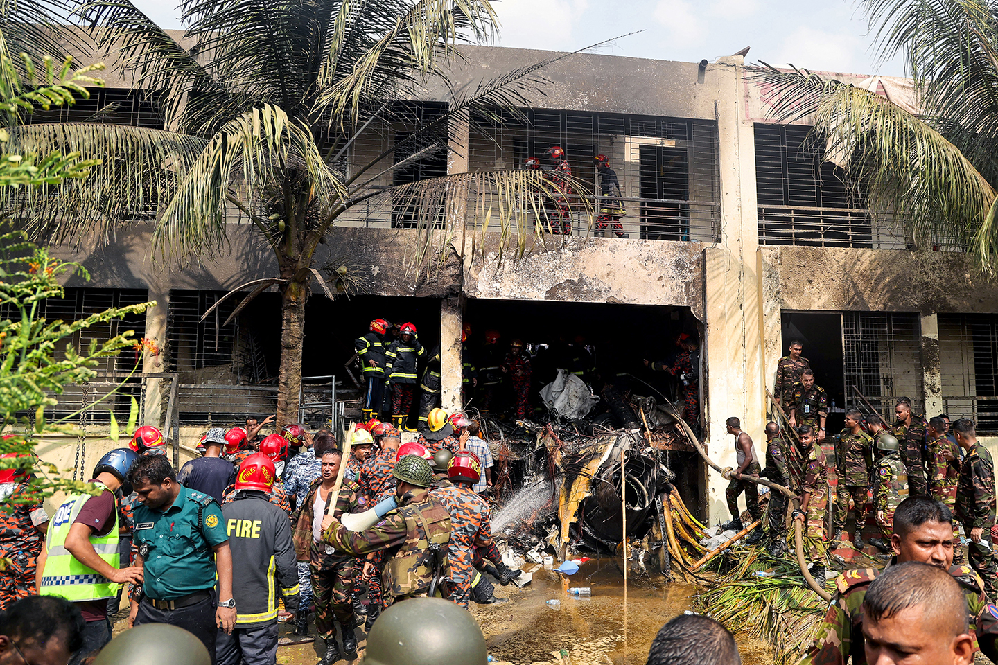 Bangladesh Air Force training jet crashes into school - The Iola Register